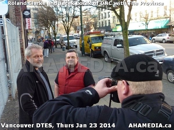 Roland Clarke and Jacek Lorek of DNC have their photos taken by The ...